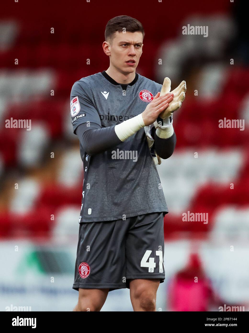 Stevenage Goalkeeper Jon McCracken applauds the fans at full time after ...
