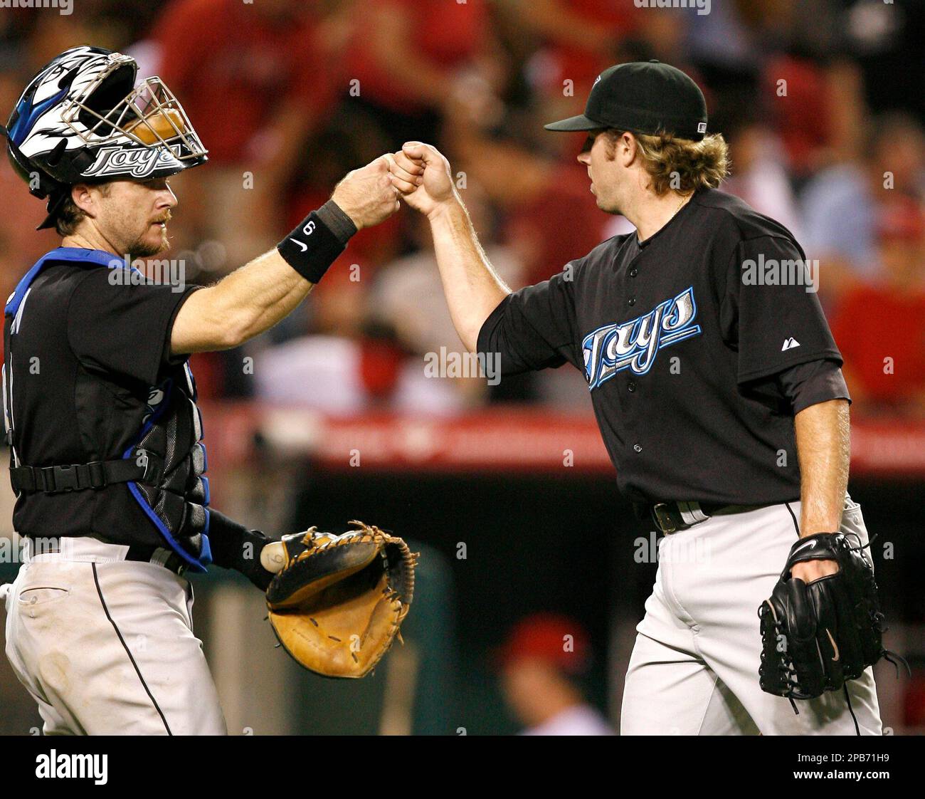 Toronto Blue Jays catcher Gregg Zaun, left, celebrates with pitcher ...