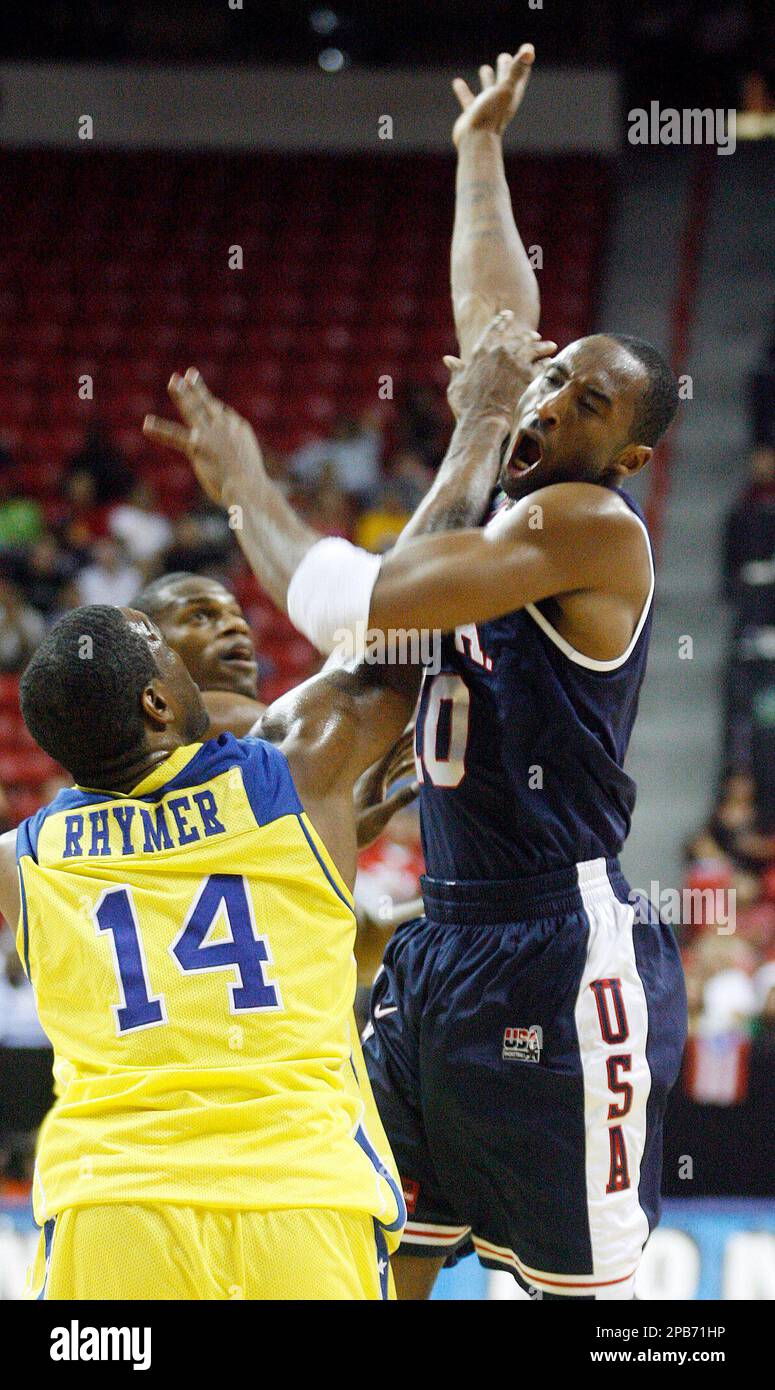 Team USA's Kobe Bryant, right, is fouled by the Virgin Islands' Kitwana ...