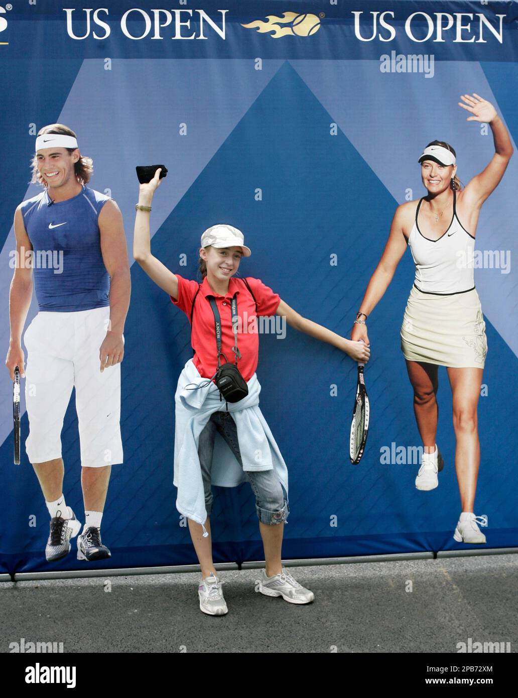 Veronika Bychkova, 12, of New Jersey, poses for her father in front of ...