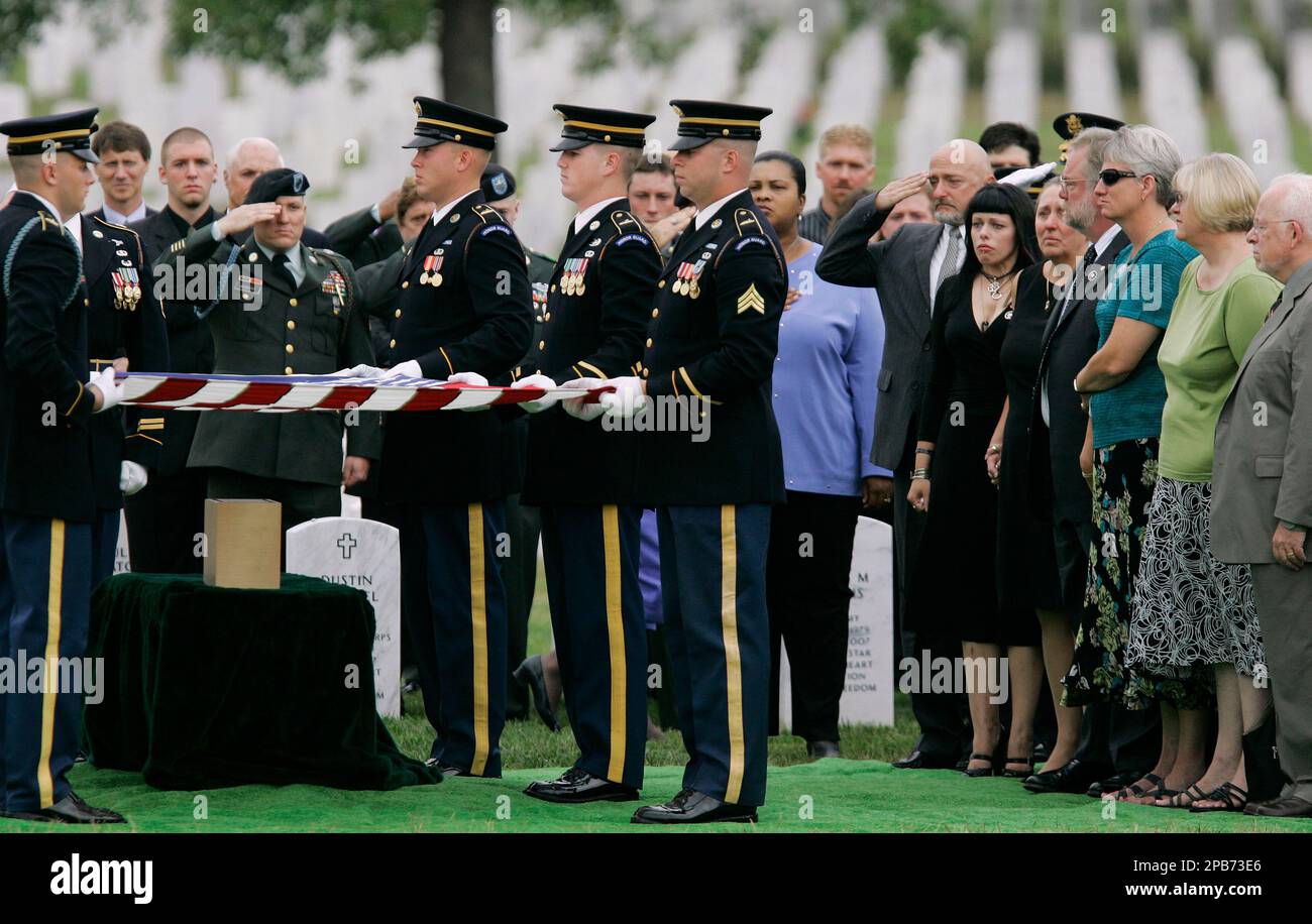 Christy Kirkpatrick, black hair and black dress, the widow of Army Sgt ...