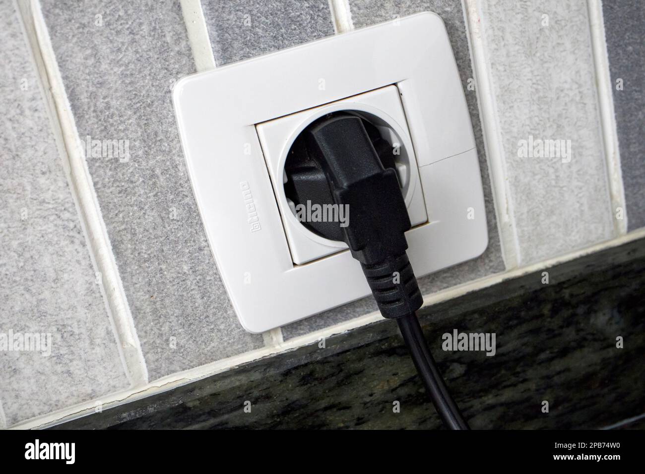 Plugged into the wall hi-res stock photography and images - Alamy