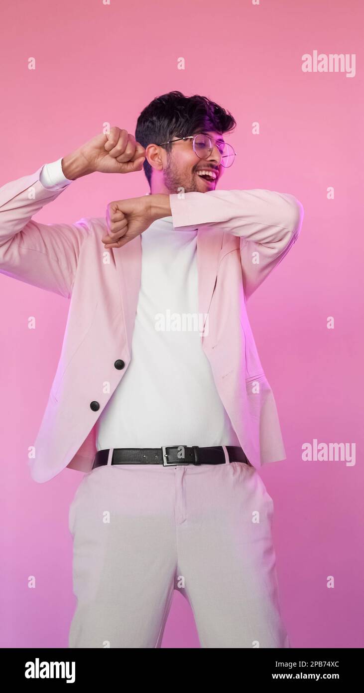 Party man euphoria joy pink excited guy dancing Stock Photo - Alamy