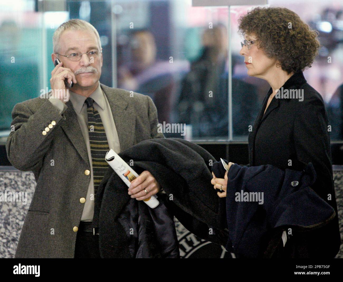 ** FILE **Rev. Scott Willis and his wife, Janet, arrive at the federal ...