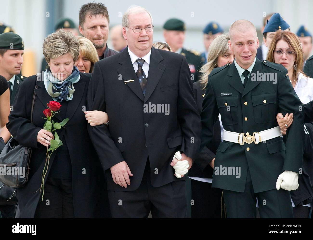 The family of Canadian Army Pvt. Simon Longtin, from left, Manon Daoust ...