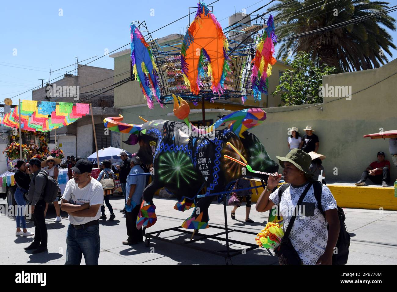 08 March 2023, Tultepec, Mexico: Persons attend monumental cardboard ...