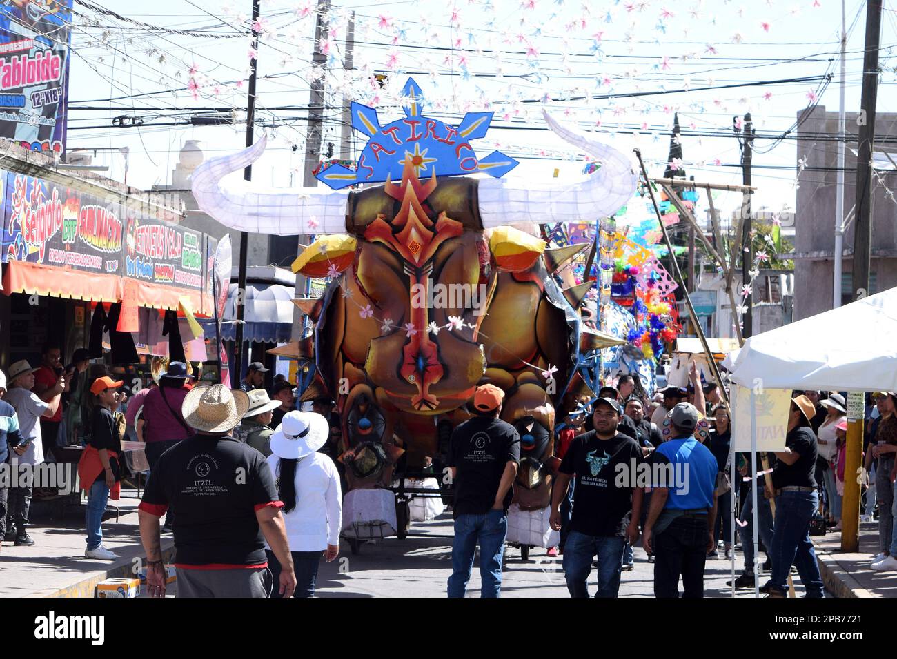 08 March 2023, Tultepec, Mexico: Persons attend monumental cardboard ...
