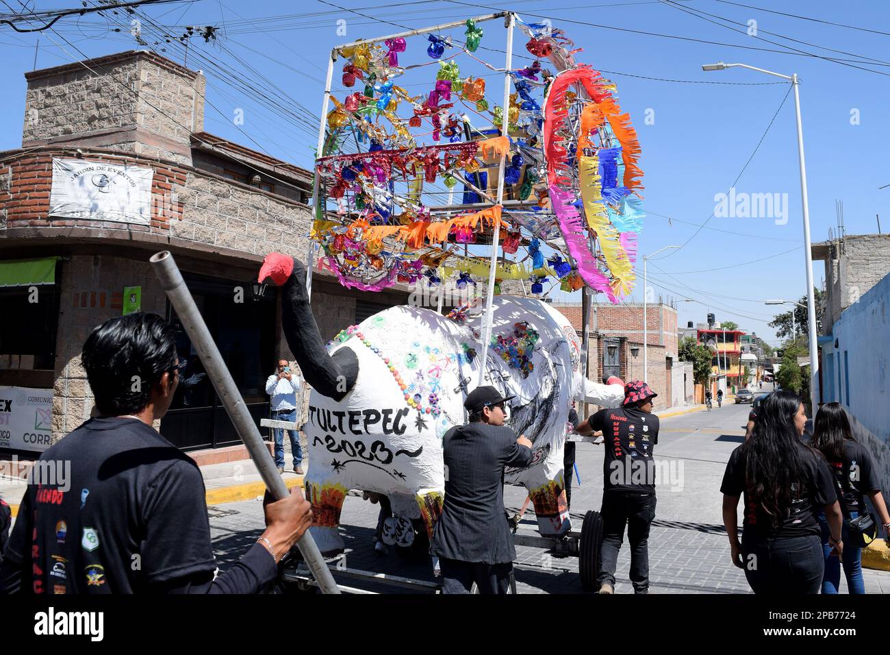 08 March 2023, Tultepec, Mexico: Persons attend monumental cardboard ...