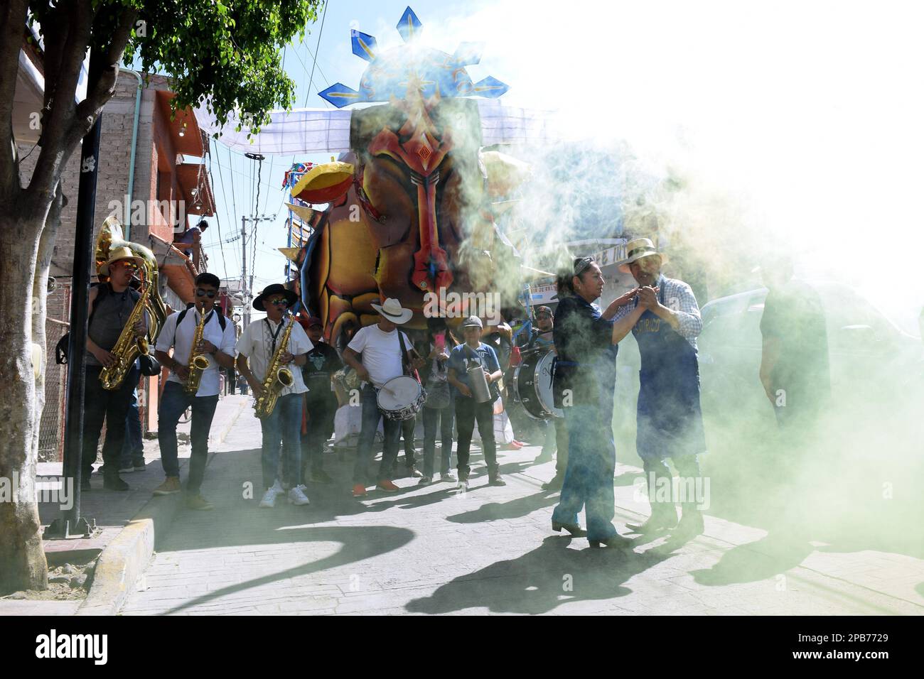 08 March 2023, Tultepec, Mexico: Persons attend monumental cardboard ...