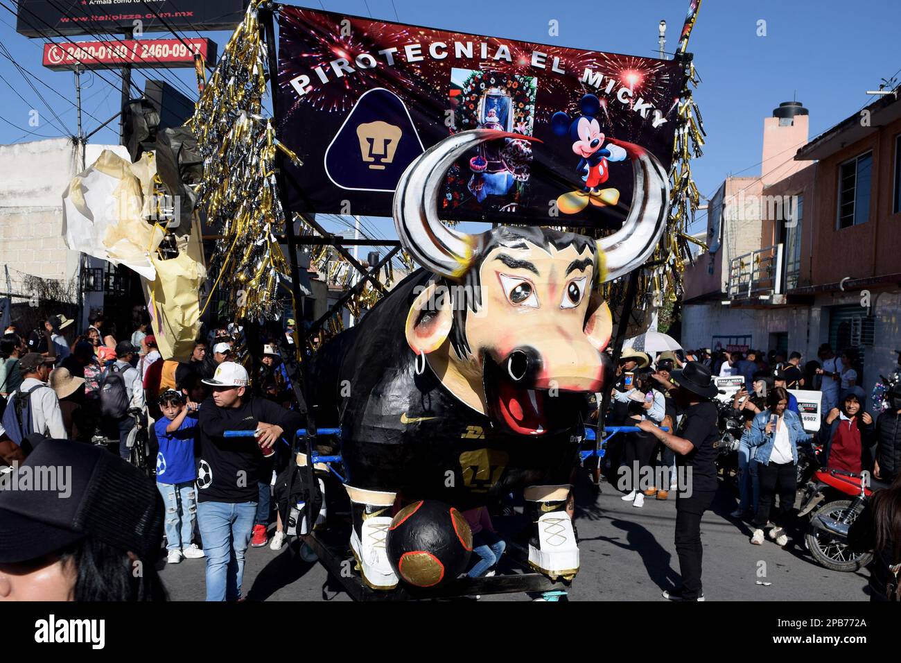 08 March 2023, Tultepec, Mexico: Persons attend monumental cardboard ...