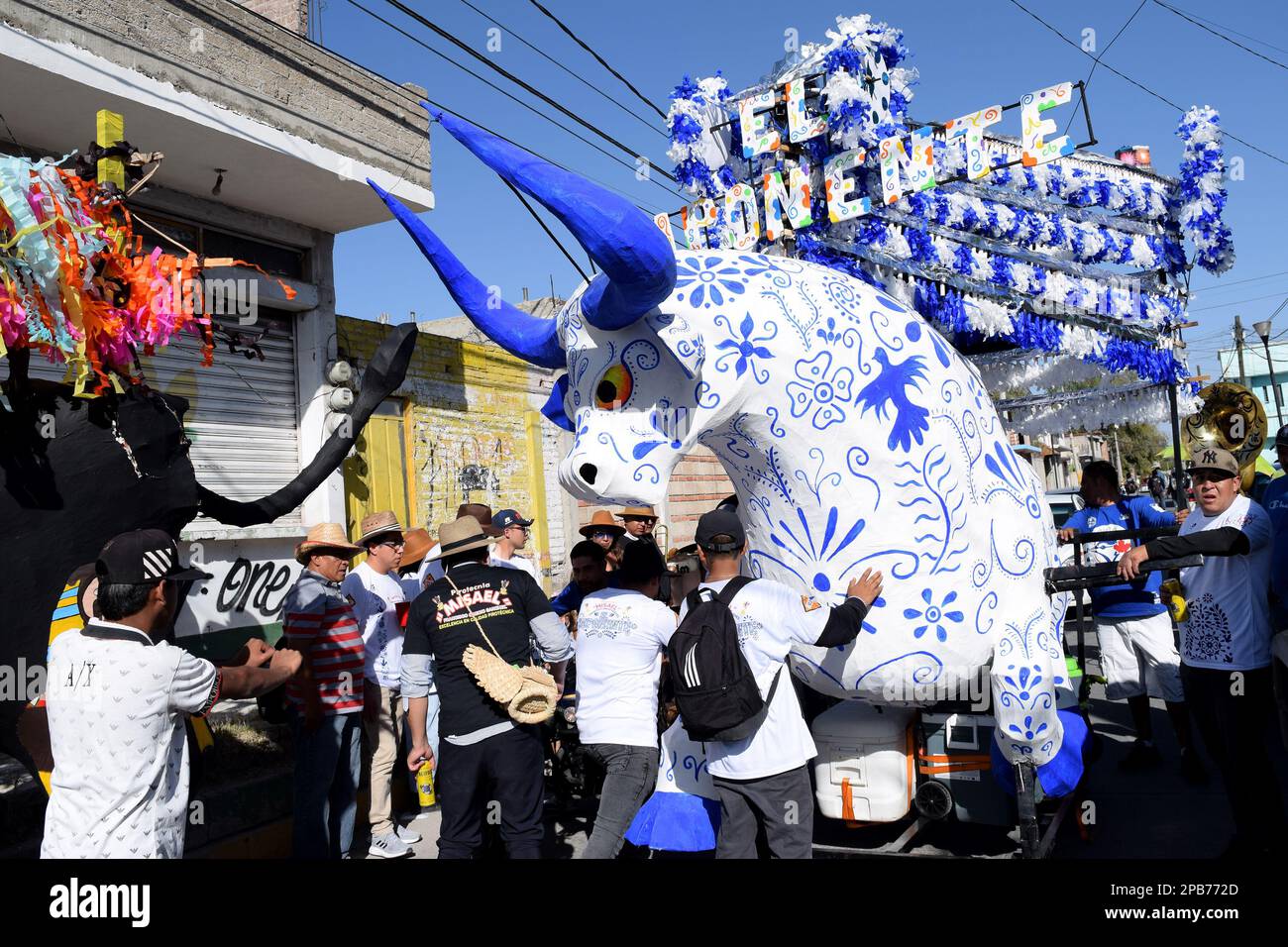 08 March 2023, Tultepec, Mexico: Persons attend monumental cardboard ...