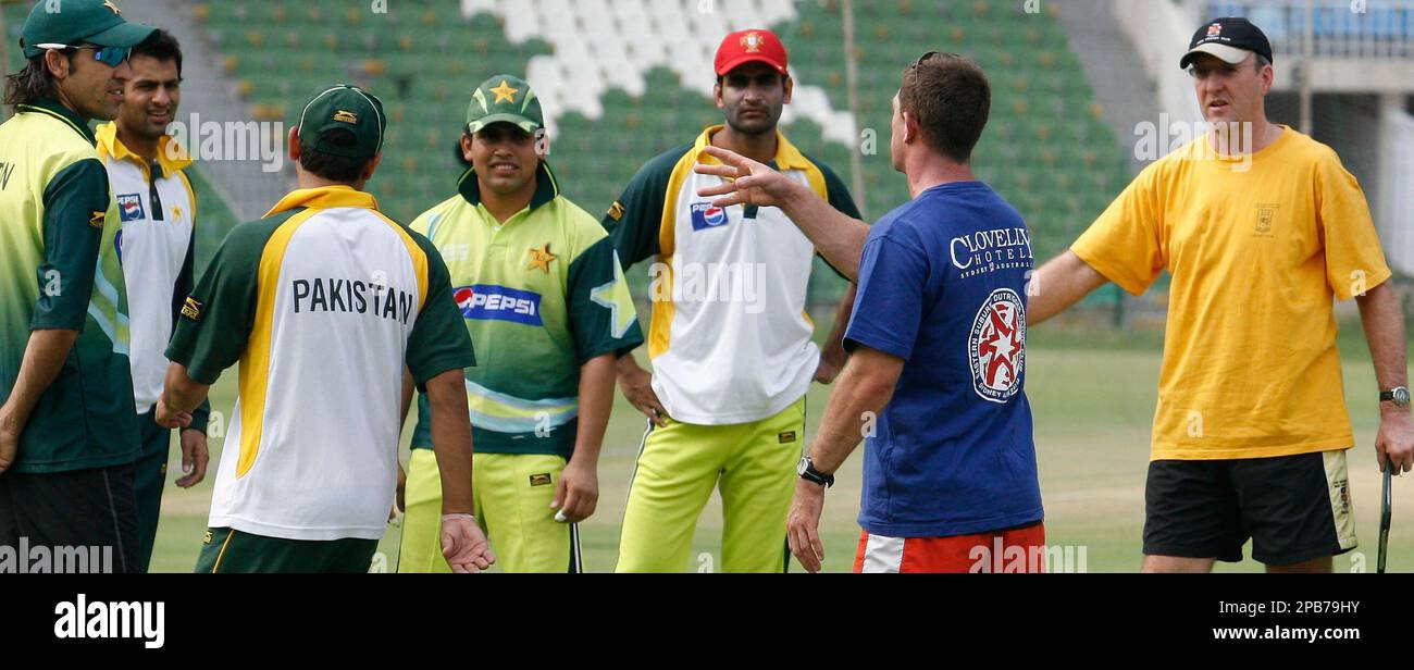 Newly appointed Pakistan's cricket team coach Geoff Lawson, right, and ...