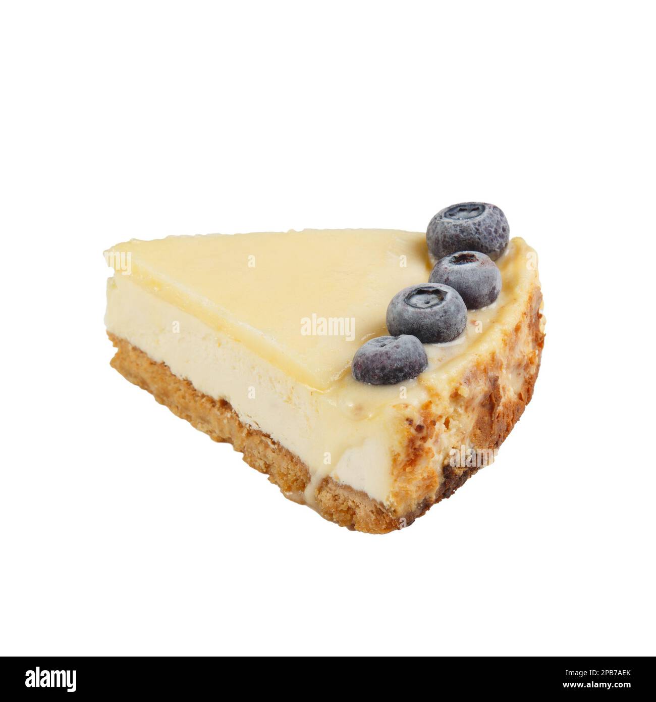 A piece of cheesecake decorated with blackberries isolated on white ...