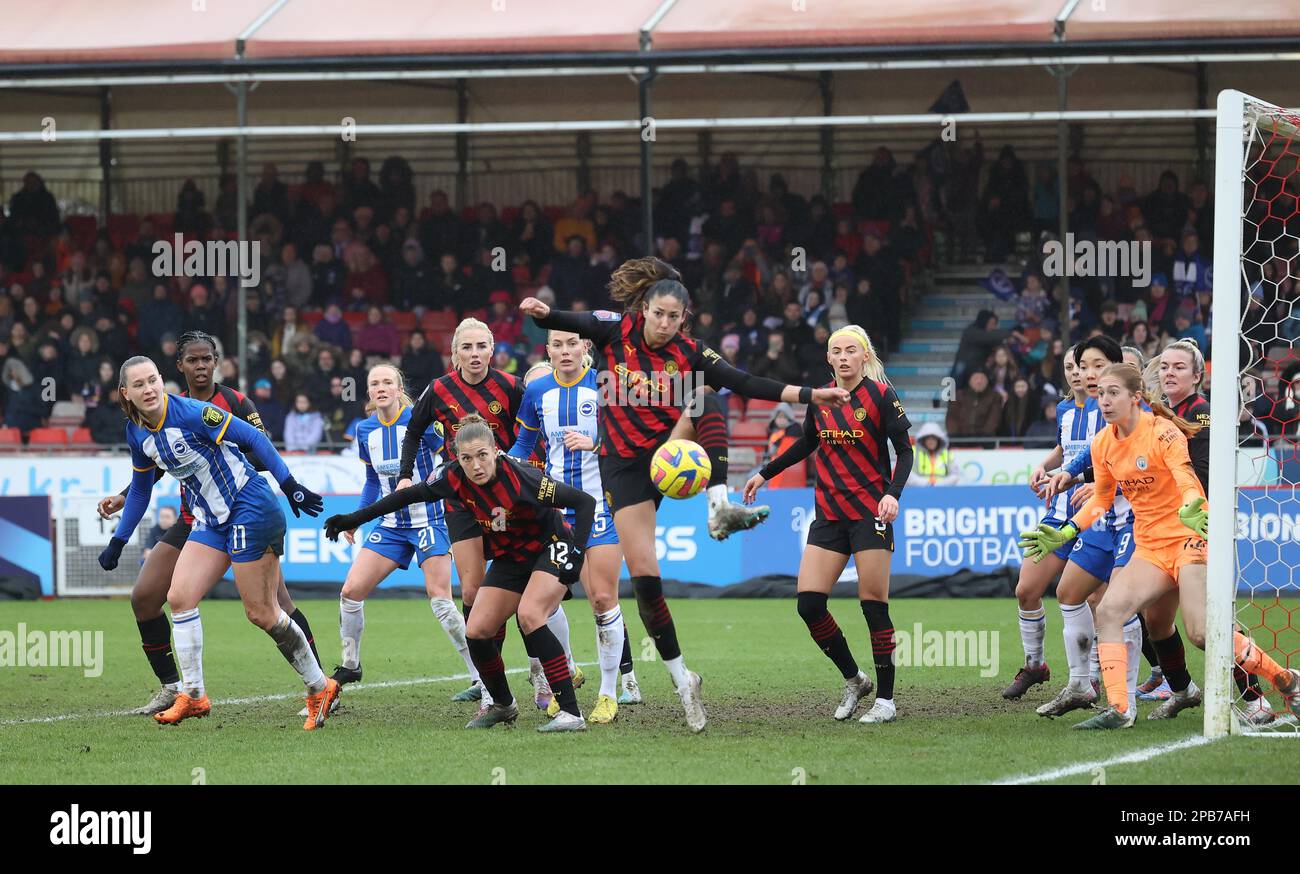 Crawley, UK. 12th Mar, 2023. Man City's Leila Ouahabi clears the ball ...