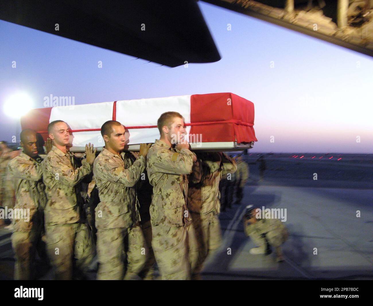 Soldiers carry the coffin of Pte. Simon Longtin on Monday, Aug. 20 ...