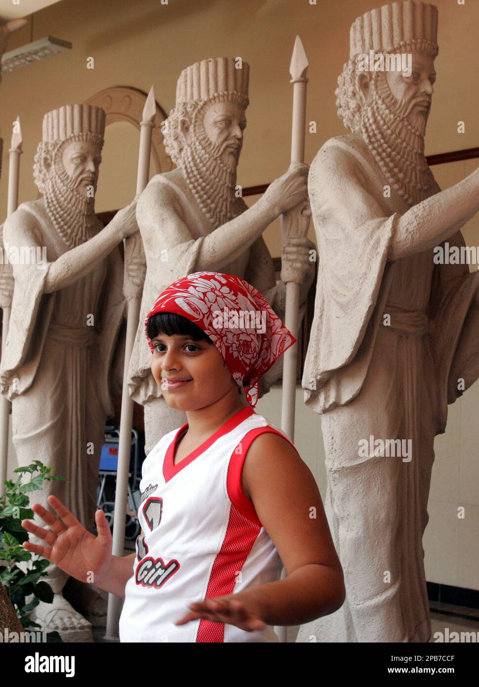 A Parsi girl comes out of the fire temple after prayers on the Parsi ...