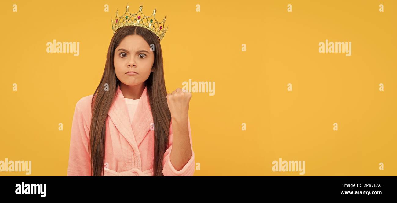 angry selfish teen girl in home terry bathrobe and princess crown ...