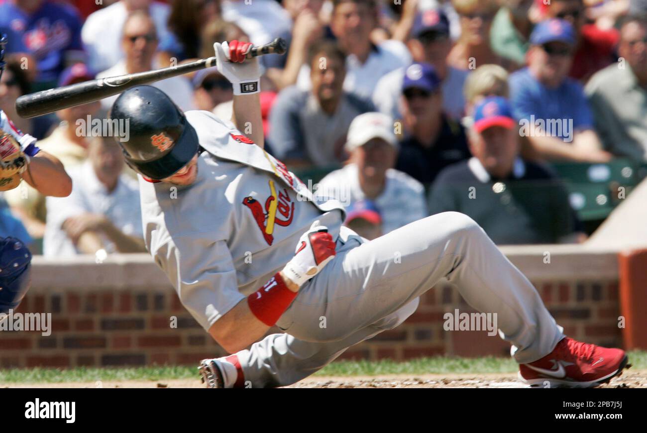 St. Louis Cardinals' Jim Edmonds hits the ground after a pitch in close ...