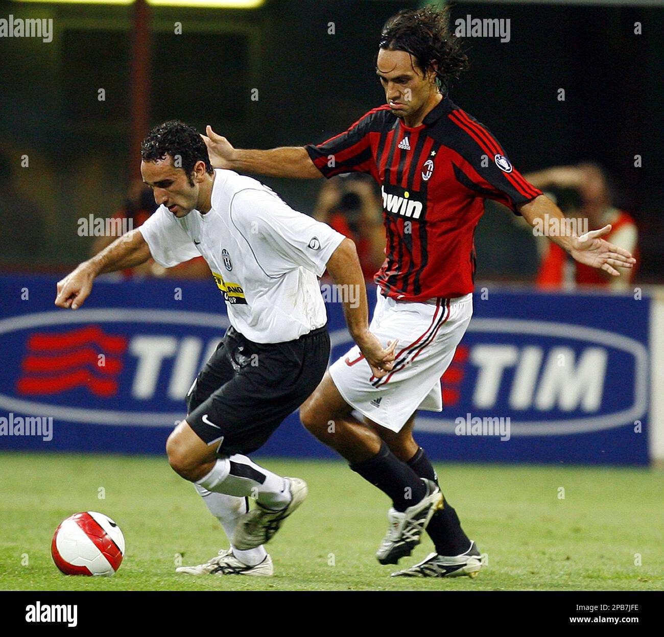 AC Milan defender Alessandro Nesta, right and Juventus' Cristian ...