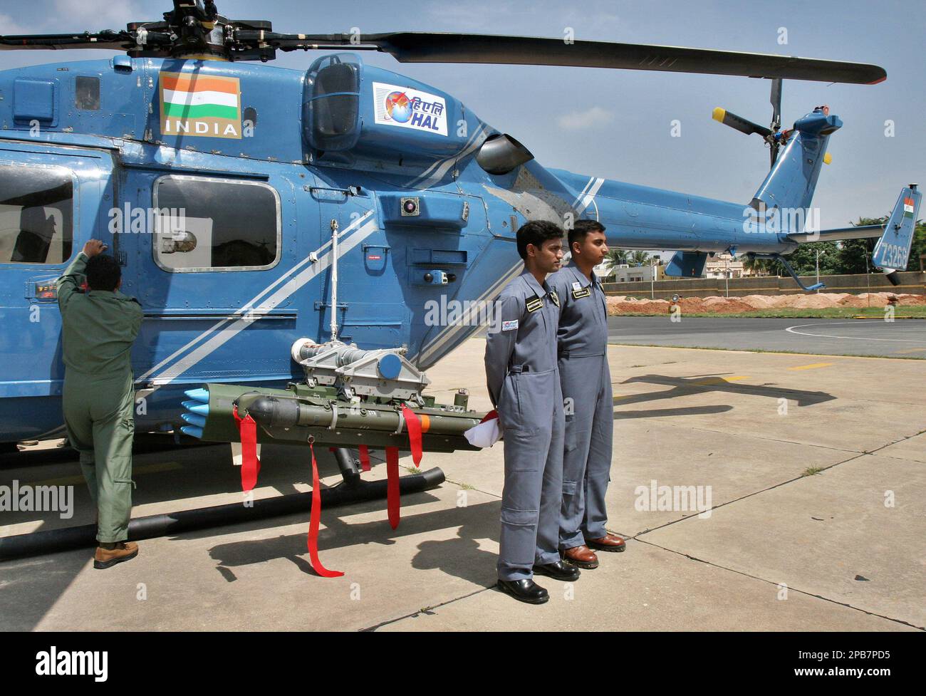 Hindustan Aeronautics Limited (HAL) officials pose for a photograph ...