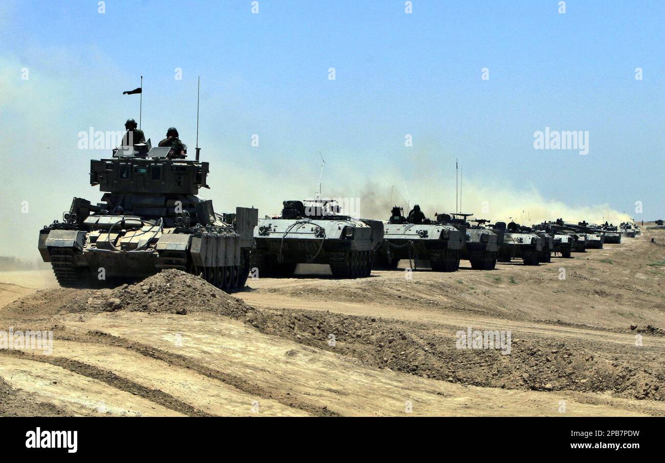 ** FILE ** An Israeli army convoy leaves the Gaza Strip at Karni ...