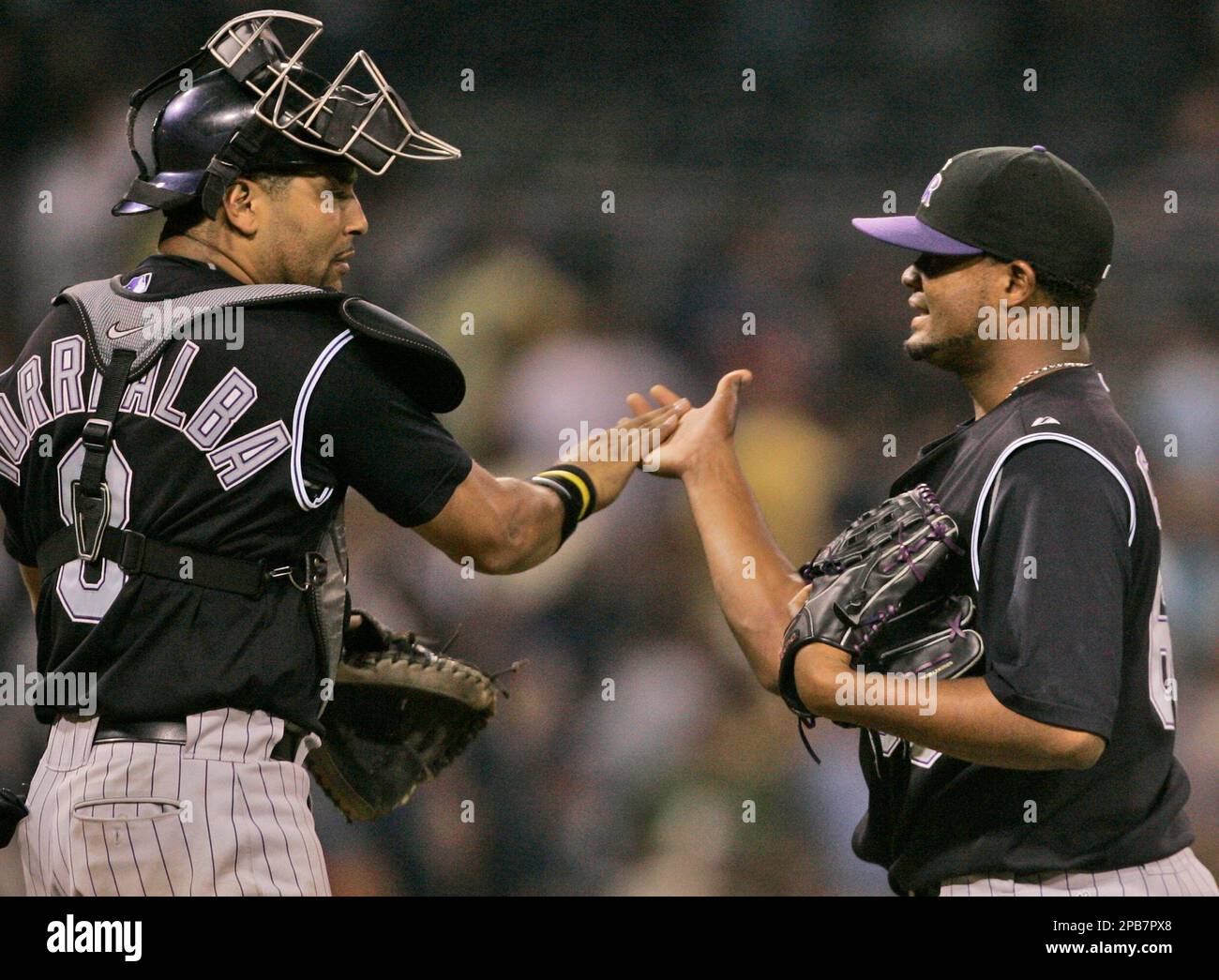 Colorado Rockies closer Manny Corpas, right, and catcher Yorvit ...