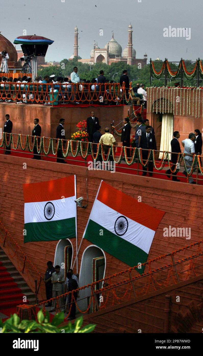 Security men stand guard on the ramparts of the 17th-century built Red ...