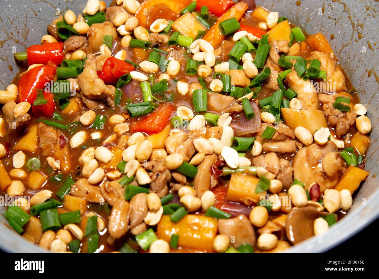 Traditional chess chicken with colorful chop suey rice. Chinese Cuisine ...