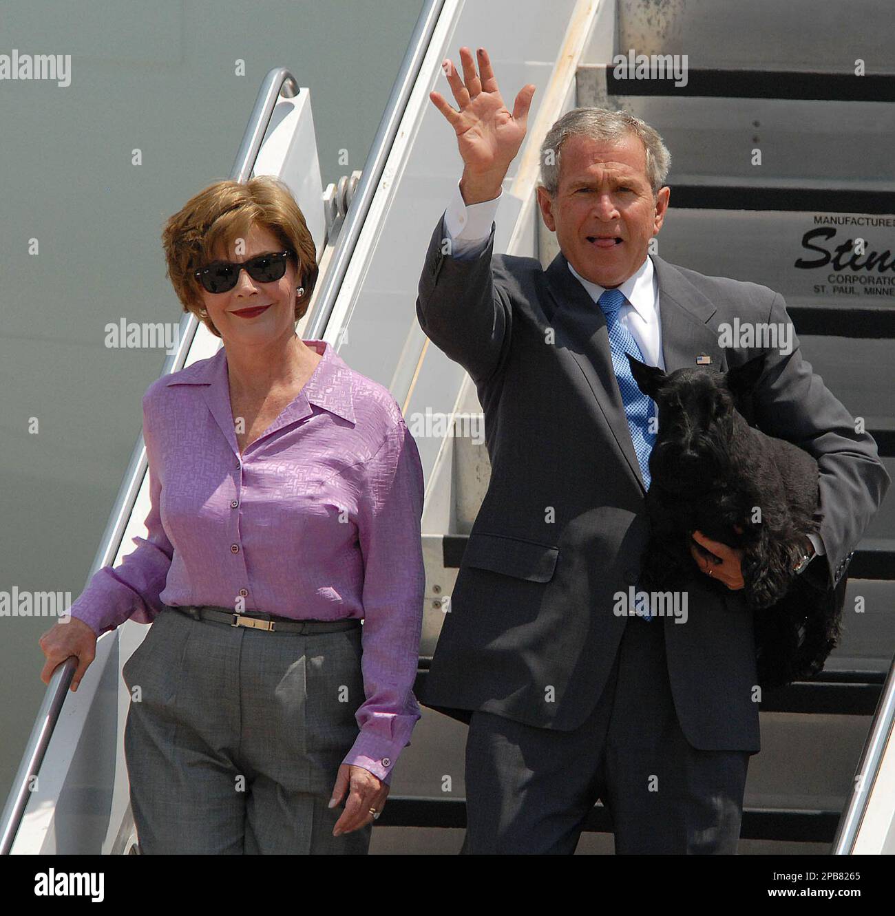 President Bush waves after arriving at TSTC airfield Monday, Aug. 13 ...