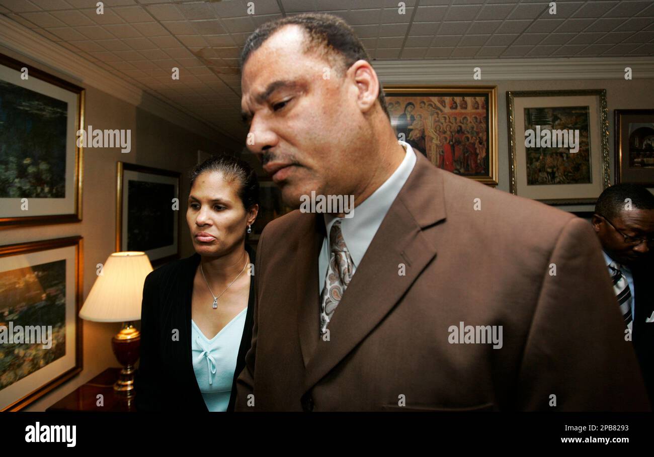 New Orleans City Council member Oliver Thomas, right, leaves after a ...
