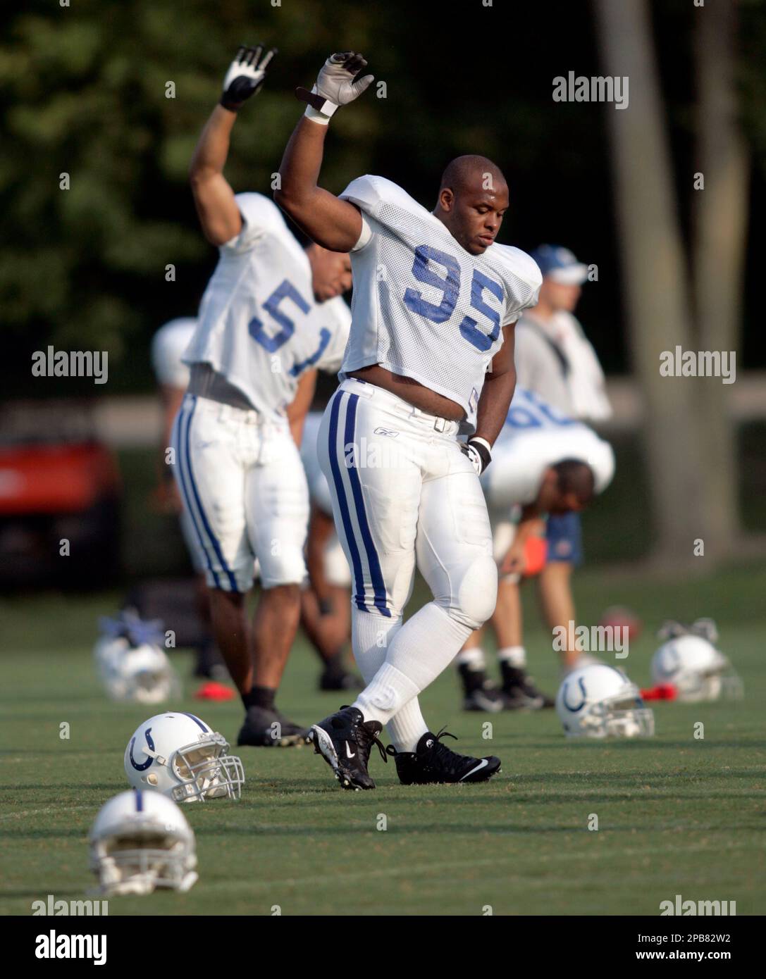 Indianapolis Colts defensive tackle Darrell Reid stretches before ...