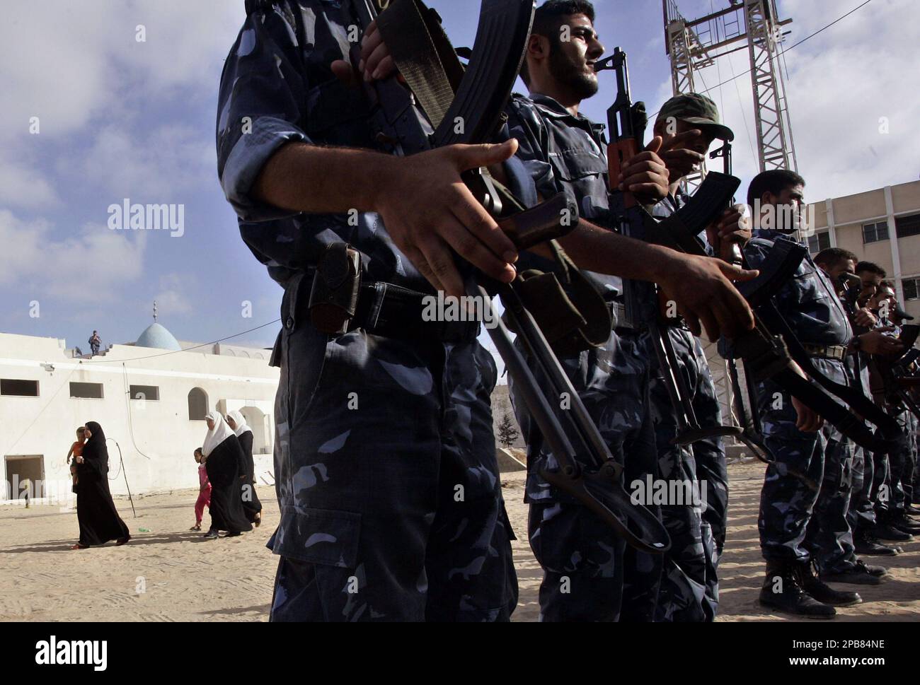 Palestinian security force members from Hamas' Executive Force stand ...