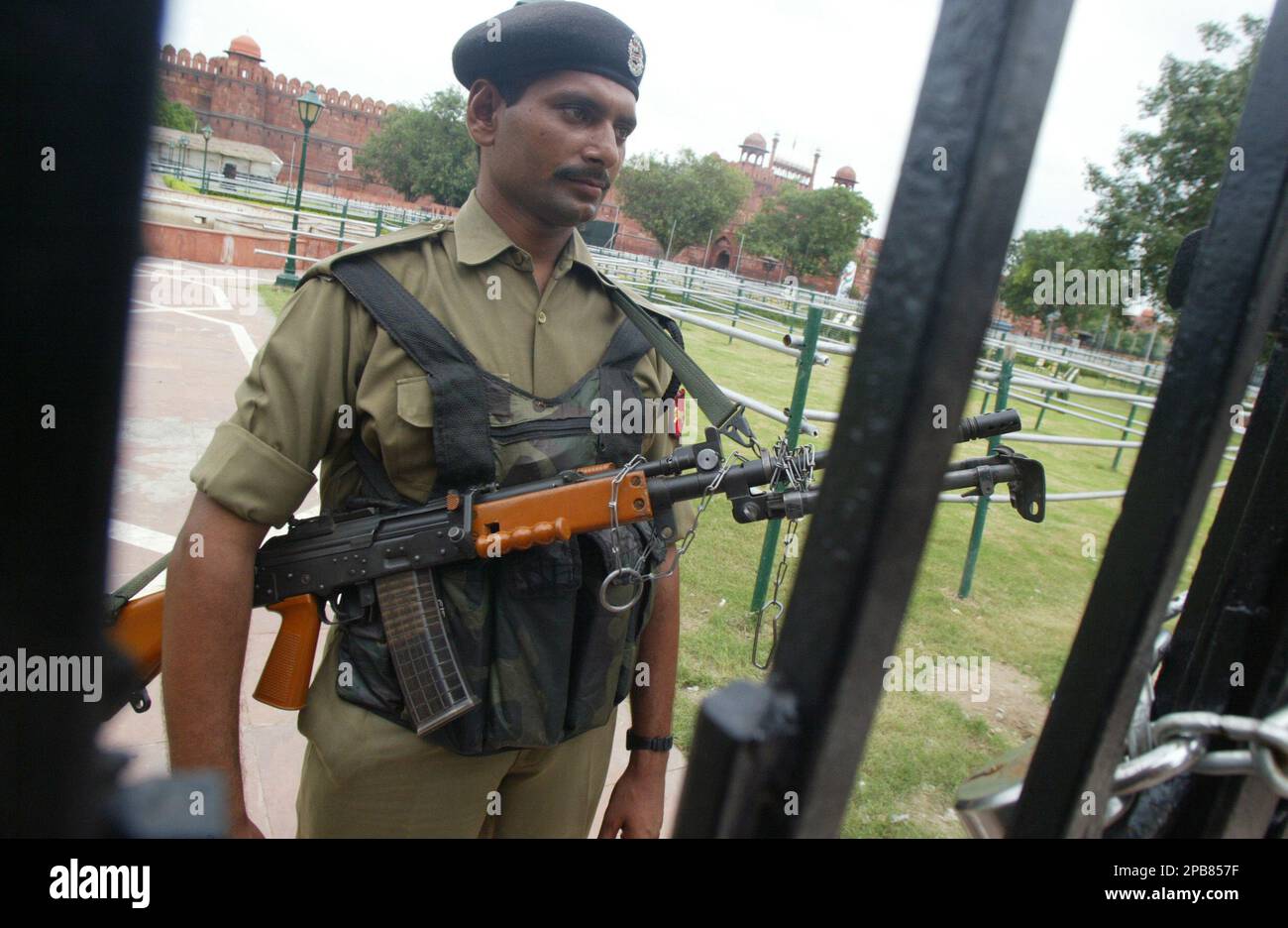 Indian police stand guard outside the Red Fort monument, from where ...