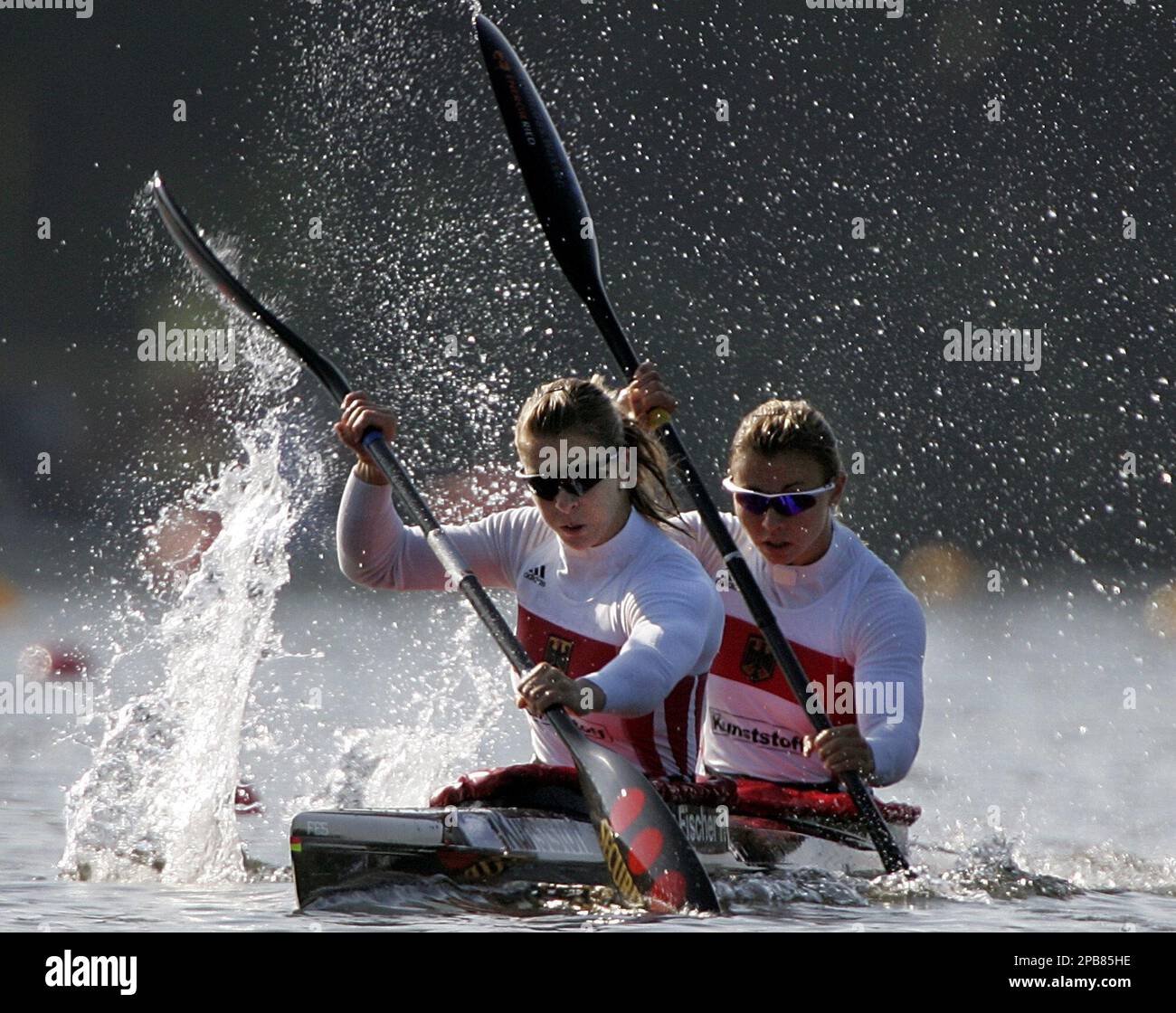 Germany's Fanny Fischer, front, and Nicole Reinhardt steer the kayak K2 ...