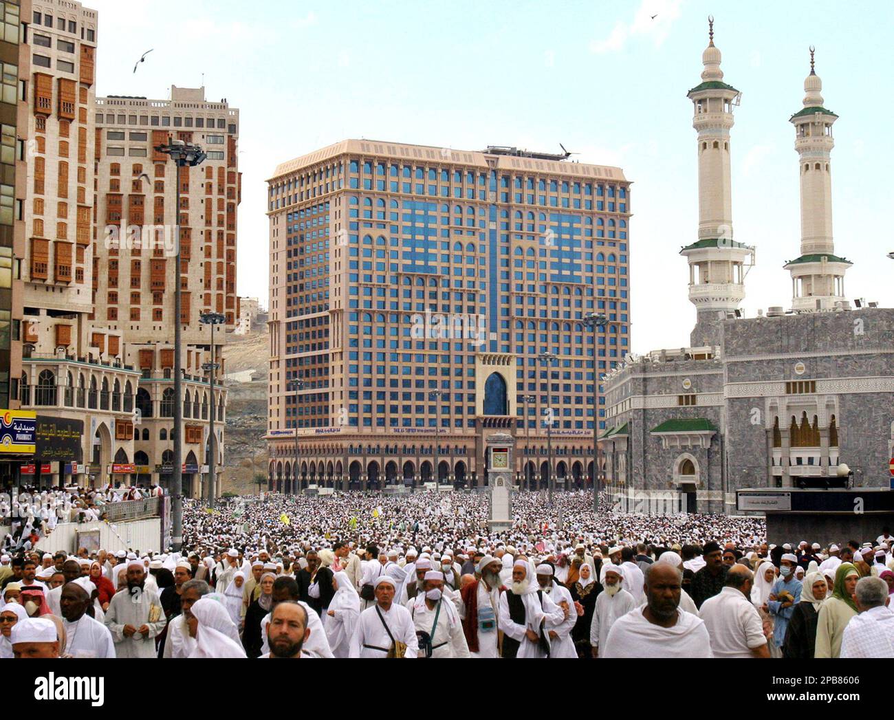 ** FILE ** Muslim Pilgrims performing the hajj walk outside the Great ...