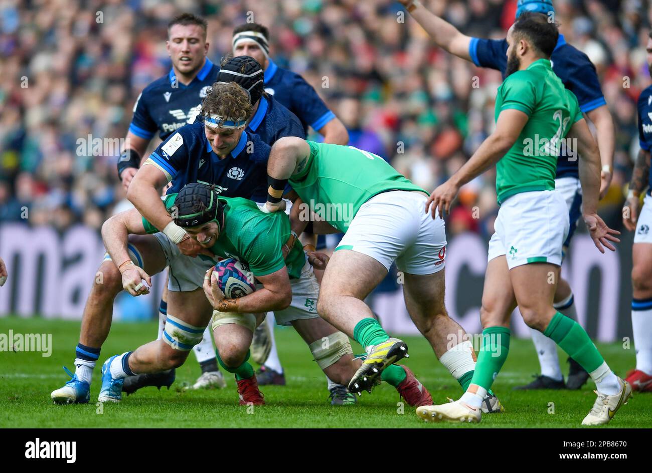 Edinburgh, UK. 12th Mar, 2023. Jamie Richie of Scotland and Ryan Baird ...