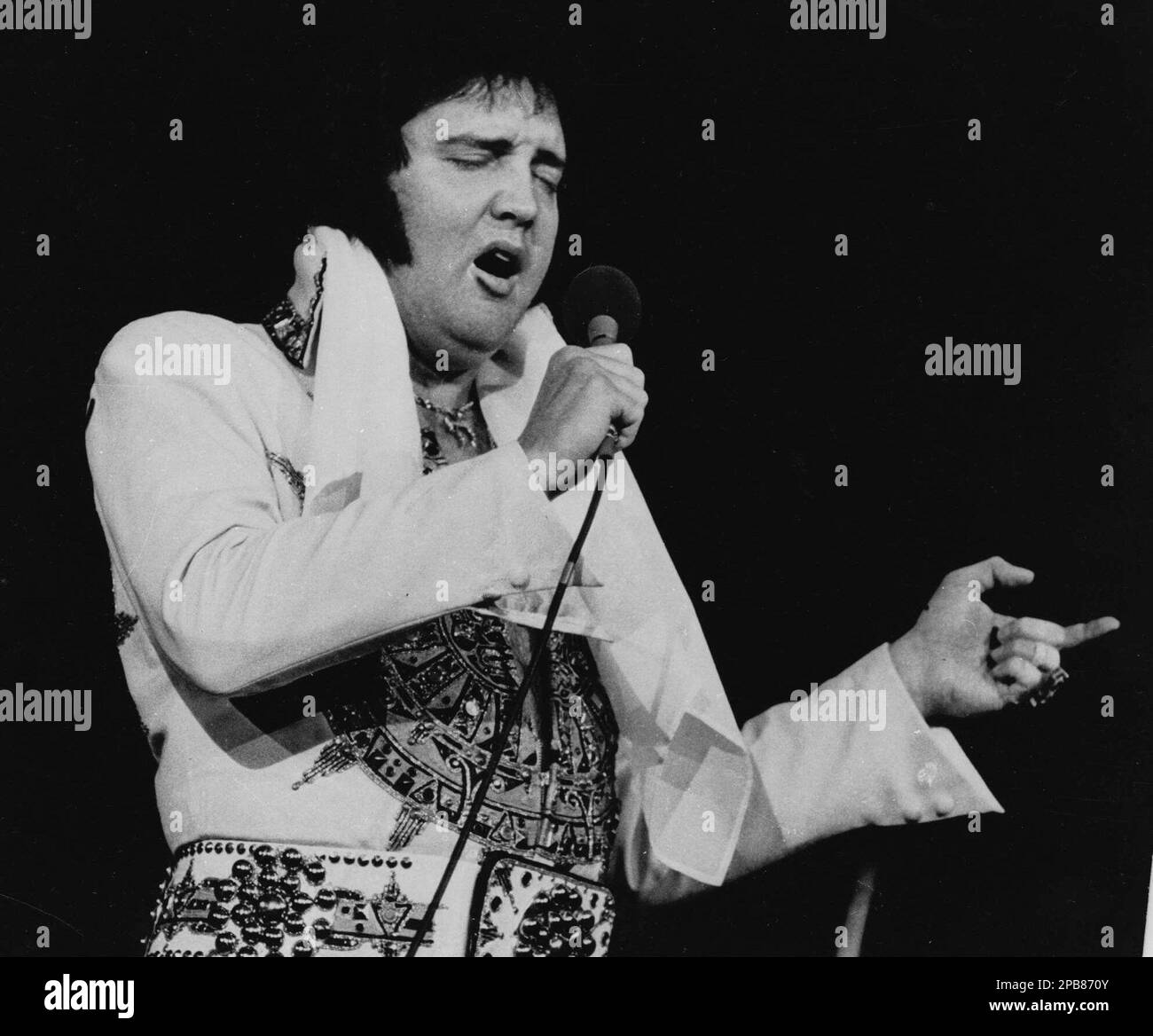 ** FILE ** Elvis Presley is shown performing in Providence, R.I. on May 23, 1977, three months ...