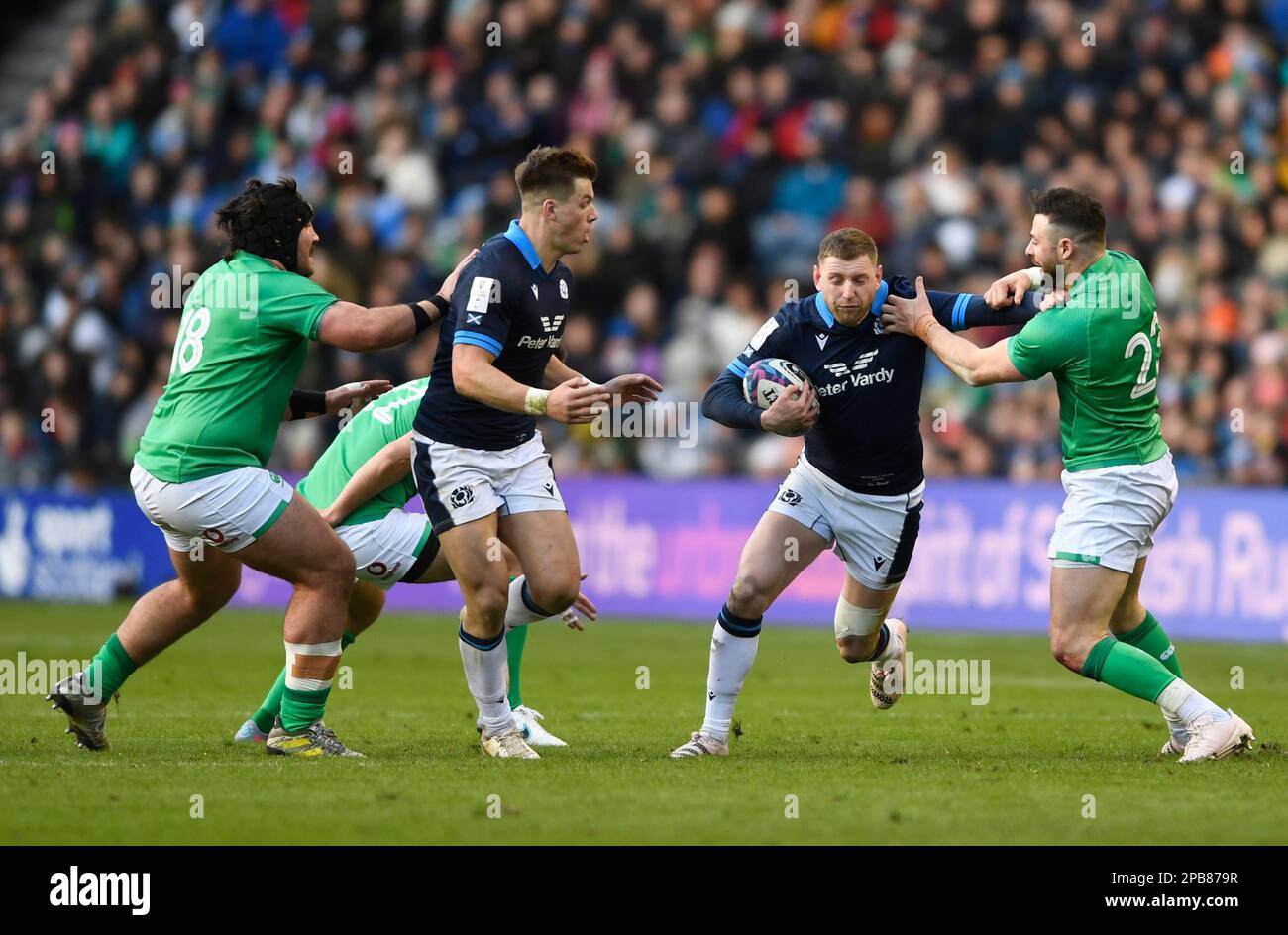 Edinburgh, UK. 12th Mar, 2023. Finn Russell of Scotland and Robbie ...