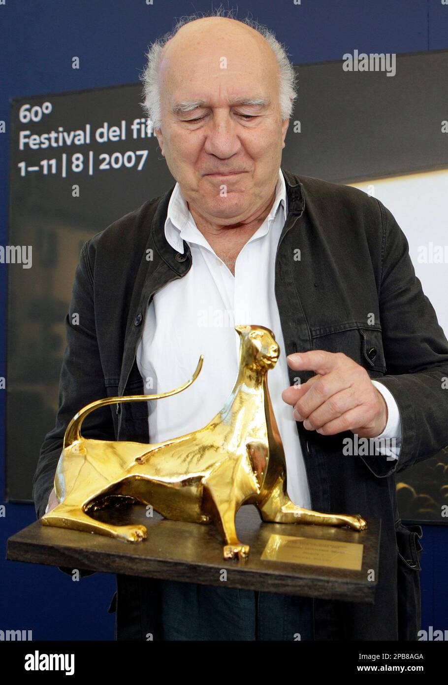 French actor Michel Piccoli points to the Excellence Award he received ...