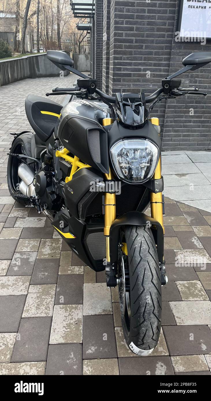 stylish black and yellow sports motorcycle on the city street Stock ...