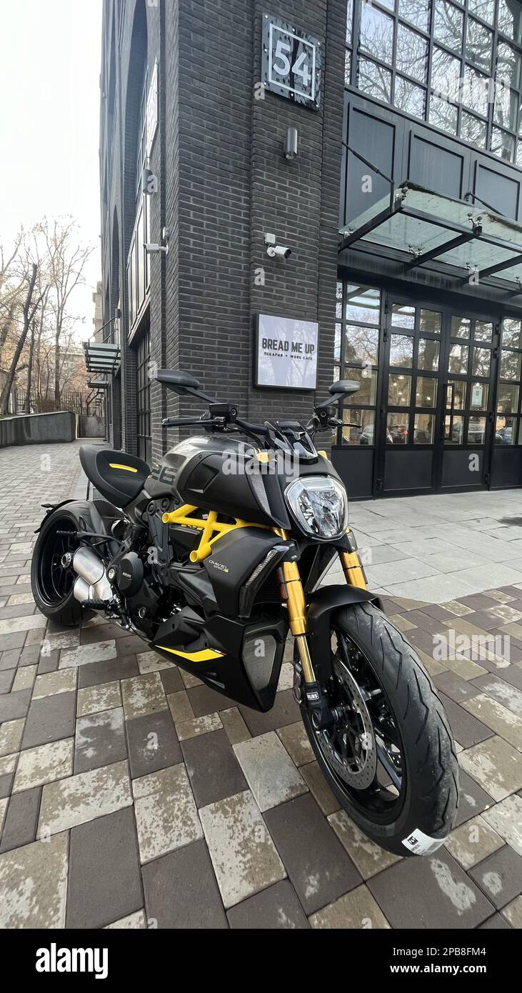 stylish black and yellow sports motorcycle on the city street Stock ...