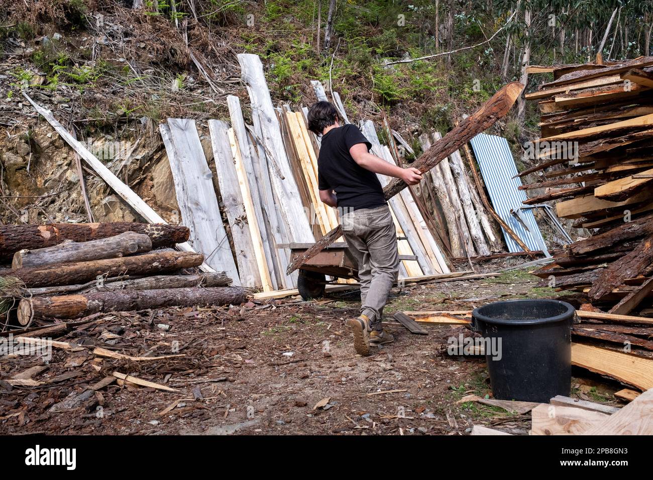 People involved in carpentry work at the eco-village of Loural in the ...