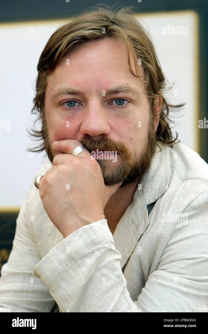 British film director Jim Threapleton poses during a photocall prior to ...