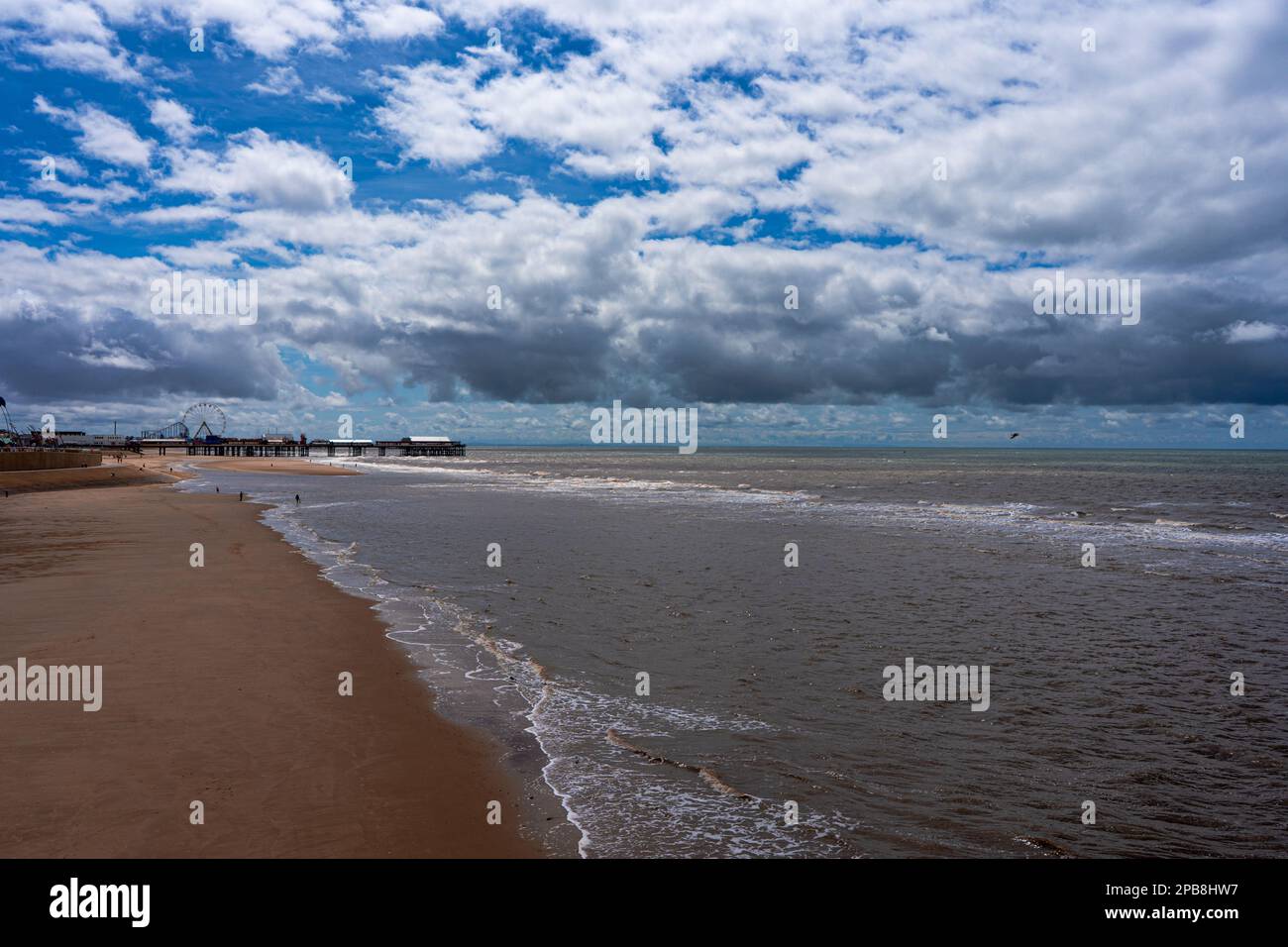 seaside beach walkway. People walking on the pier Stock Photo - Alamy