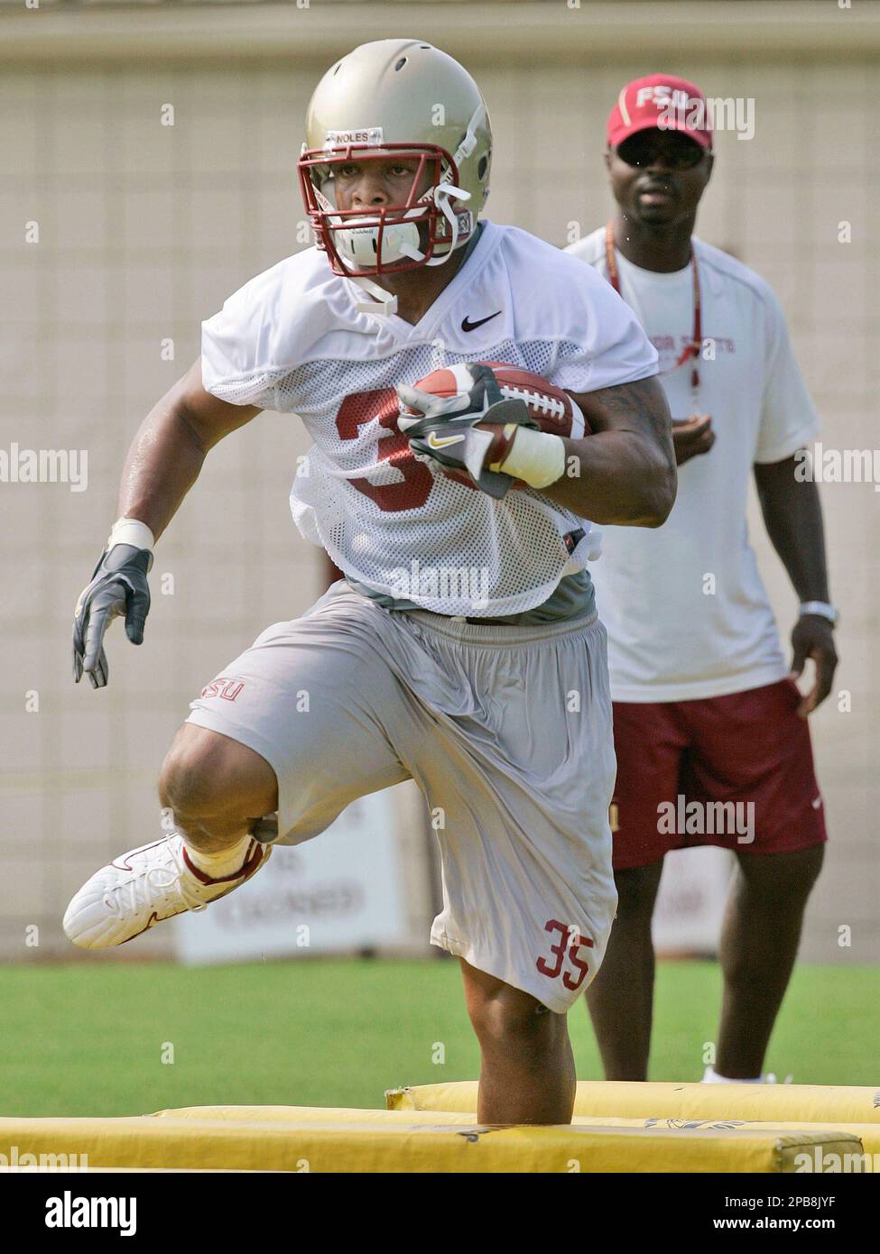 Florida State running back Marcus Sims goes through drills during the ...