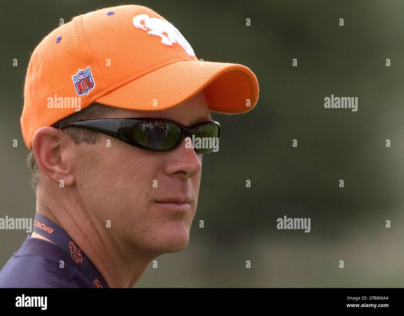 Denver Broncos general manager Ted Sundquist looks on during the first ...