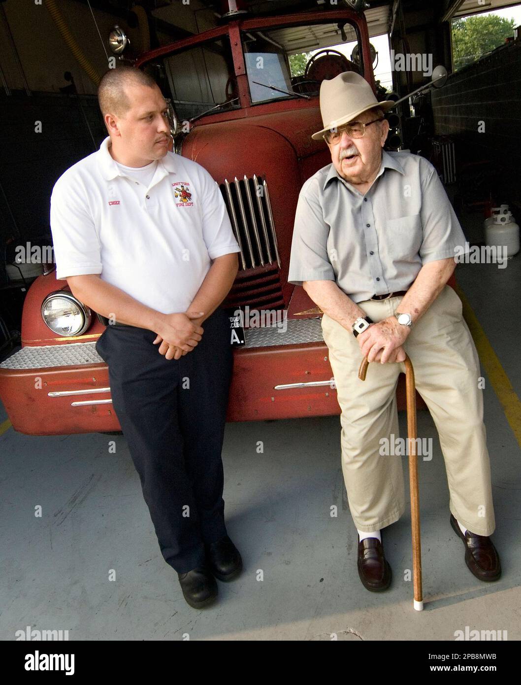 Current Grottoes Fire Chief Andrew Holloway sits on the front bumper of ...