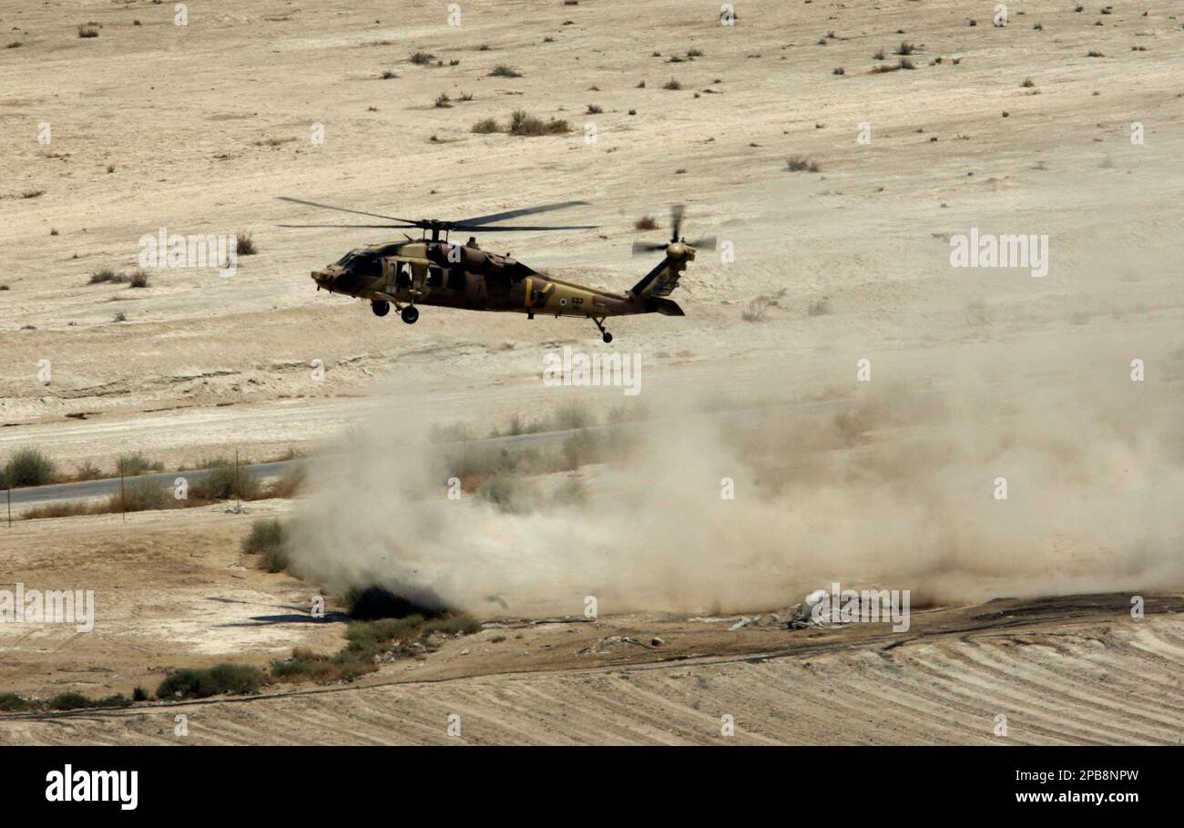 An Israeli military helicopter securing Israeli Prime Minister's Ehud ...