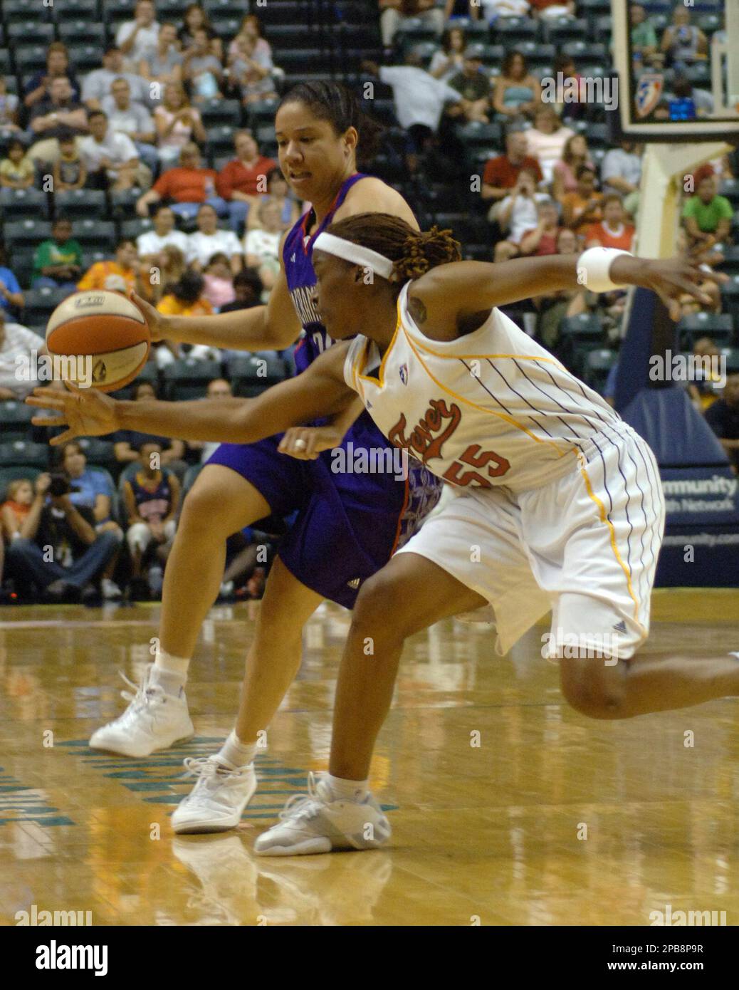 Indiana Fever's Sheri Sam, right, defends Sacramento Monarchs' Kara ...