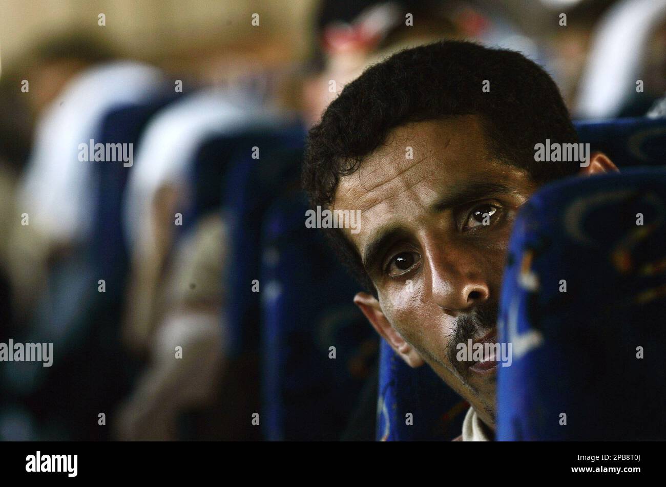 A Palestinian man sits in a bus at the Nitzana border crossing between ...